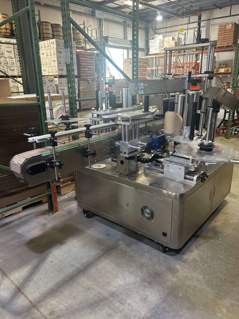 Two Head Full-Wrap Pressure Sensitive Labeler | Valiant Industries